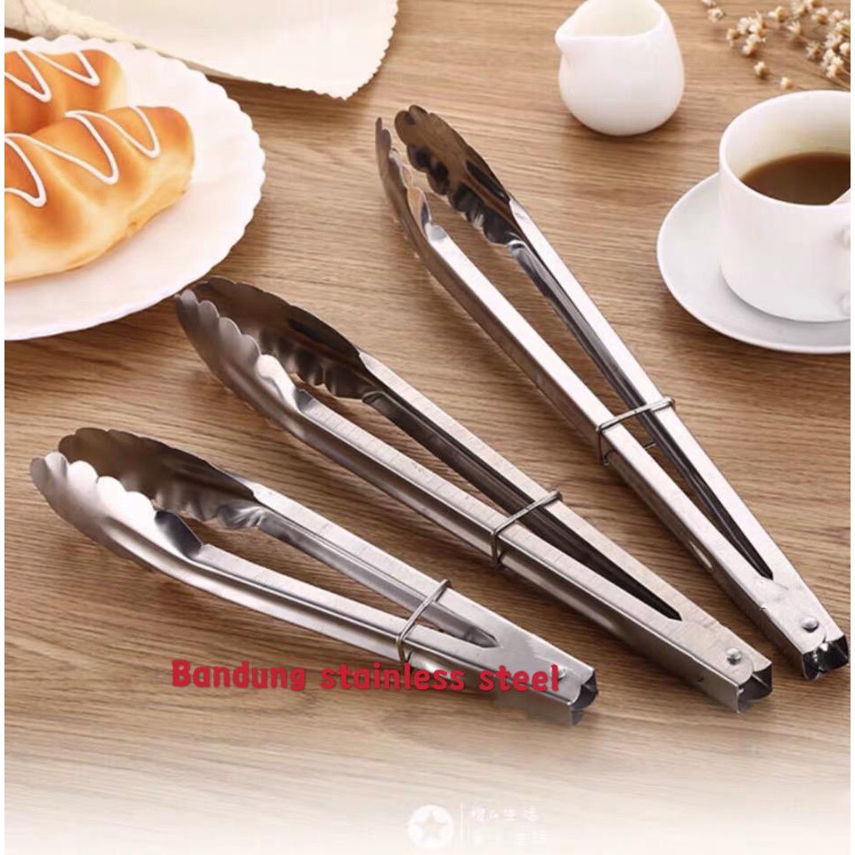 Jual capit makanan jepit capitan roti kue serbaguna tipis stainless ...