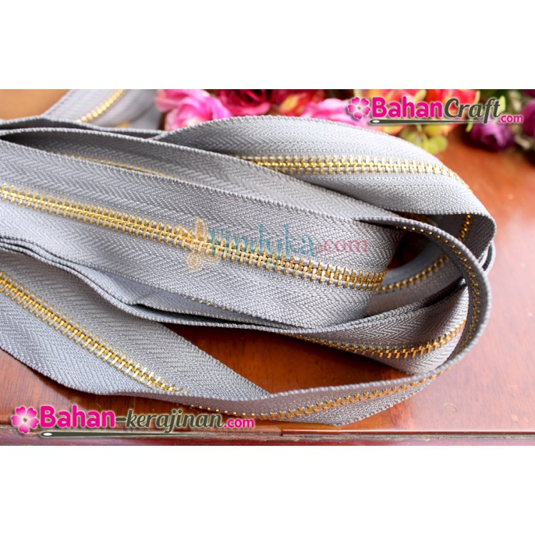 Jual Resleting Gigi Besi Gold Abu-abu harga per meter (Nita Tri ...