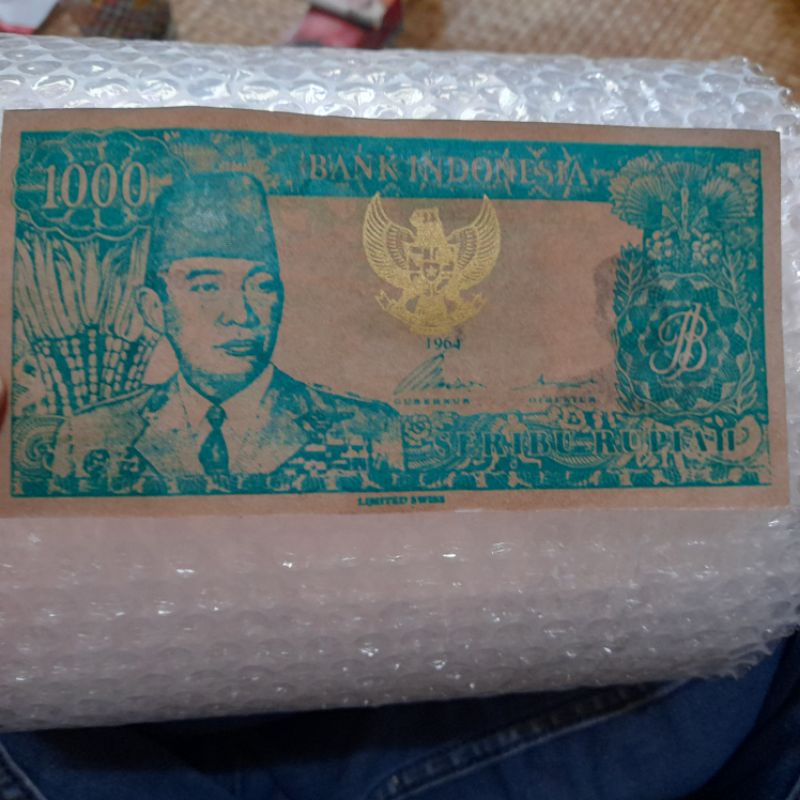 Jual uang soekarno serimpi 7 melengkung pecahan 1000 rupiah merah atau ...