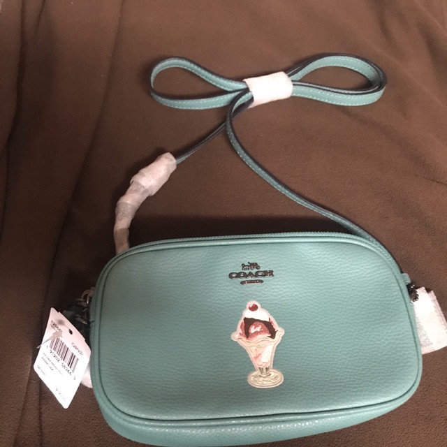 Jual Coach ice cream crossbody pouch | Shopee Indonesia