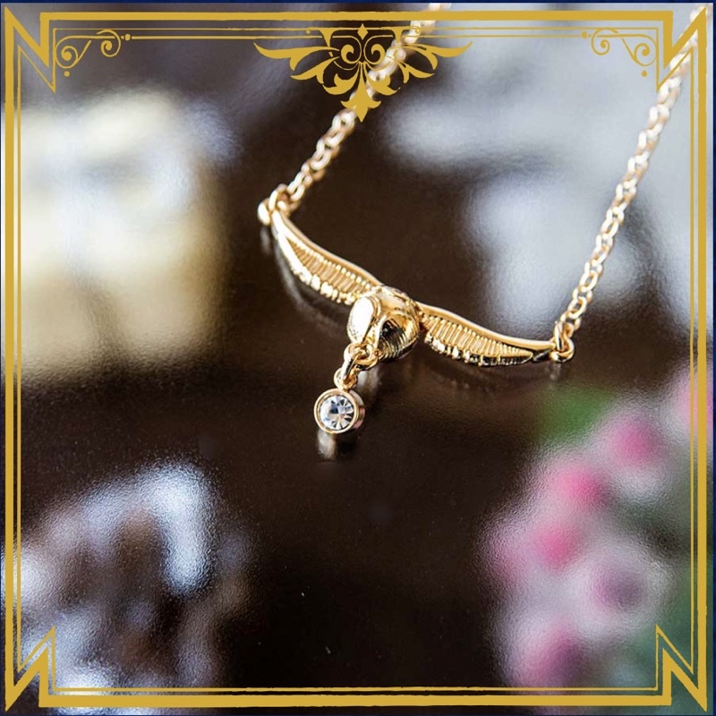 Jual Harry Potter Golden Snitch necklace official merchandise Wizarding ...