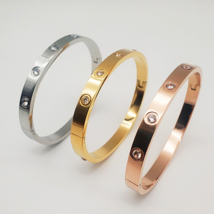 Jual Gelang Wanita bentuk oval permata simbol minus dan full permata ...