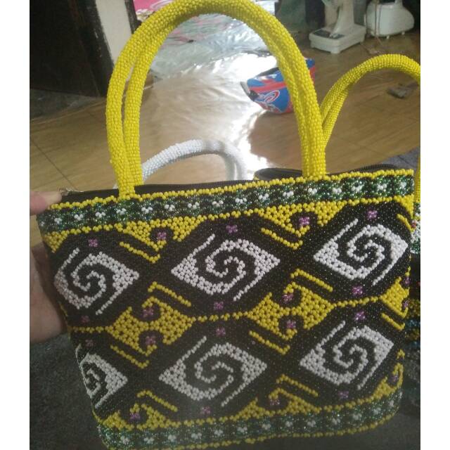 Jual Tas tangan motif khas dayak, motif tiung | Shopee Indonesia