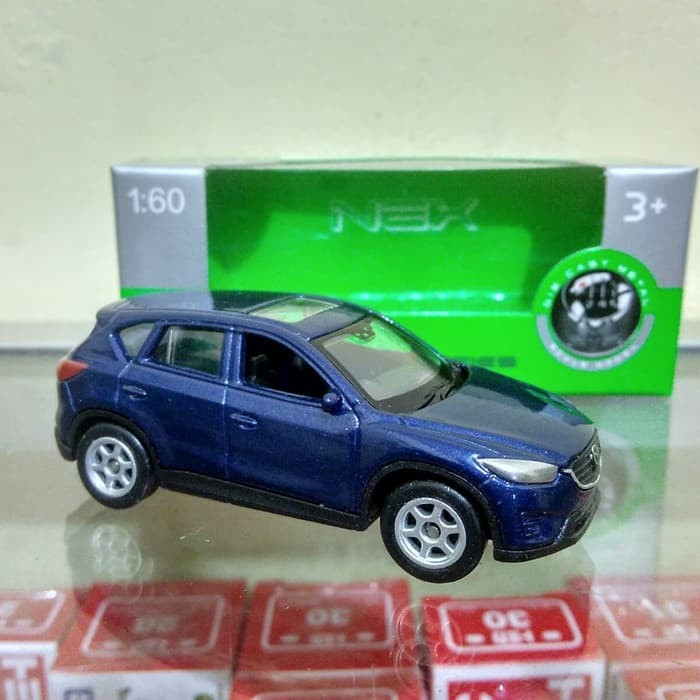 Jual Miniatur Mazda CX-5 biru Diecast mobil sport Welly Nex skala 60 ...