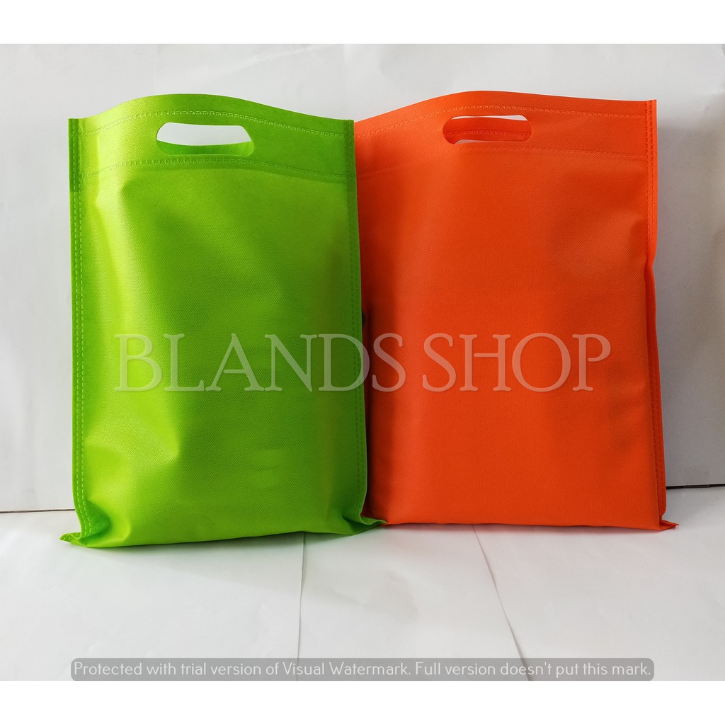 Jual Tas Kain Spunbond Oval 30 x 40 Murah Furing Bag Goodie Bag Oval ...