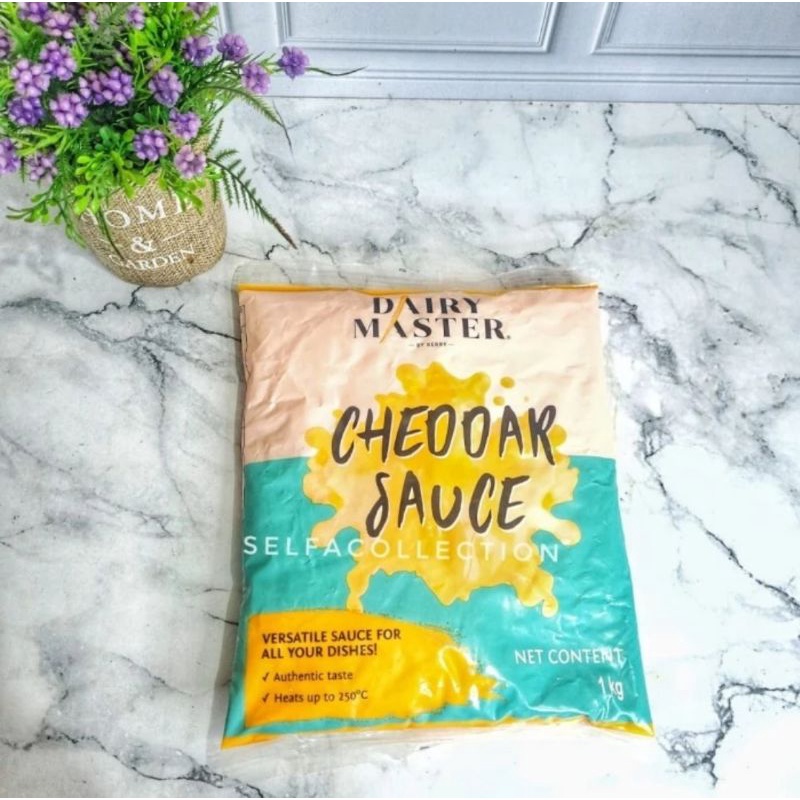 Jual Dairy Master Cheddar Cheese Sauce 1 kg Saus Krim Keju Siap Pakai ...