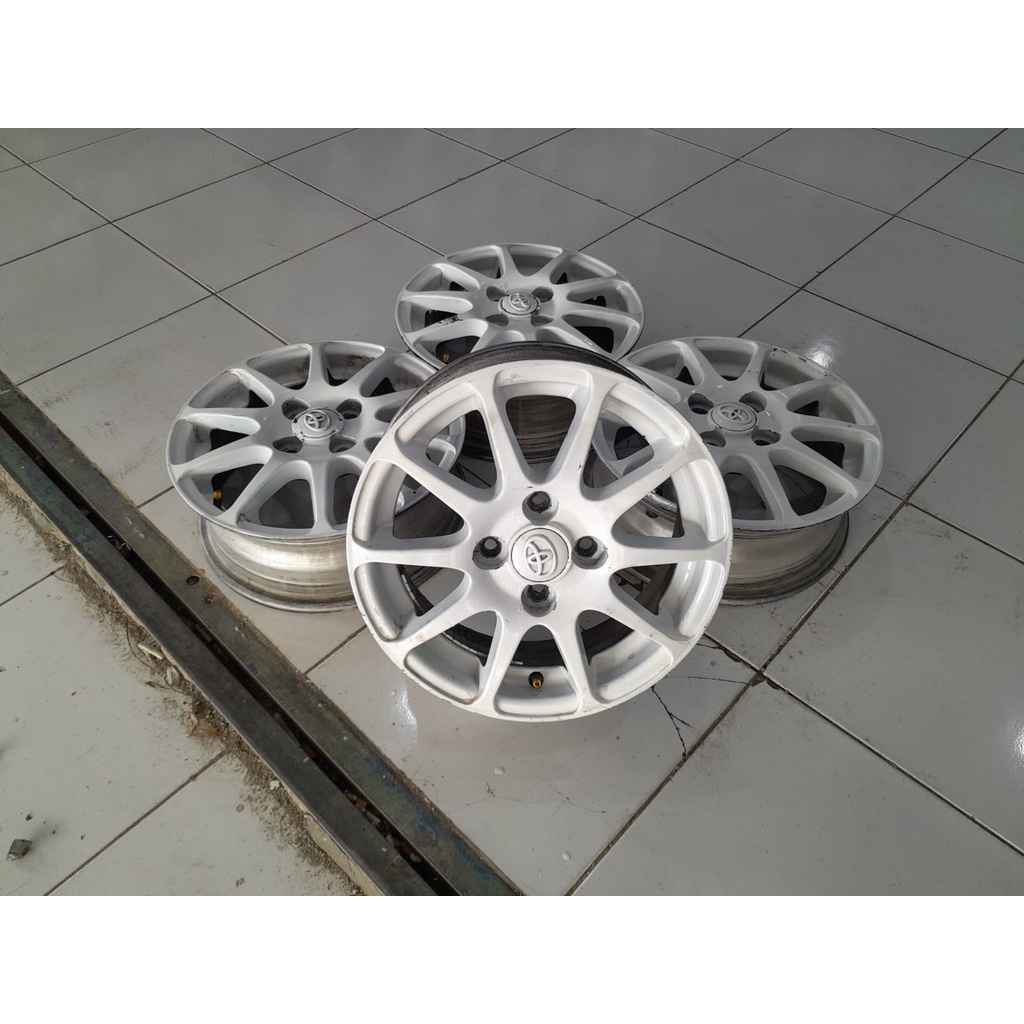 Jual Velg Bekas Copotan Mobil Oem Std Proton Savvy R14 Baut 4x100 Putih ...