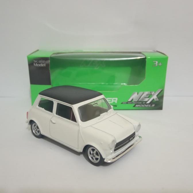 Jual Diecast mini cooper 1300 putih moris polos Welly skala 60 harga ...