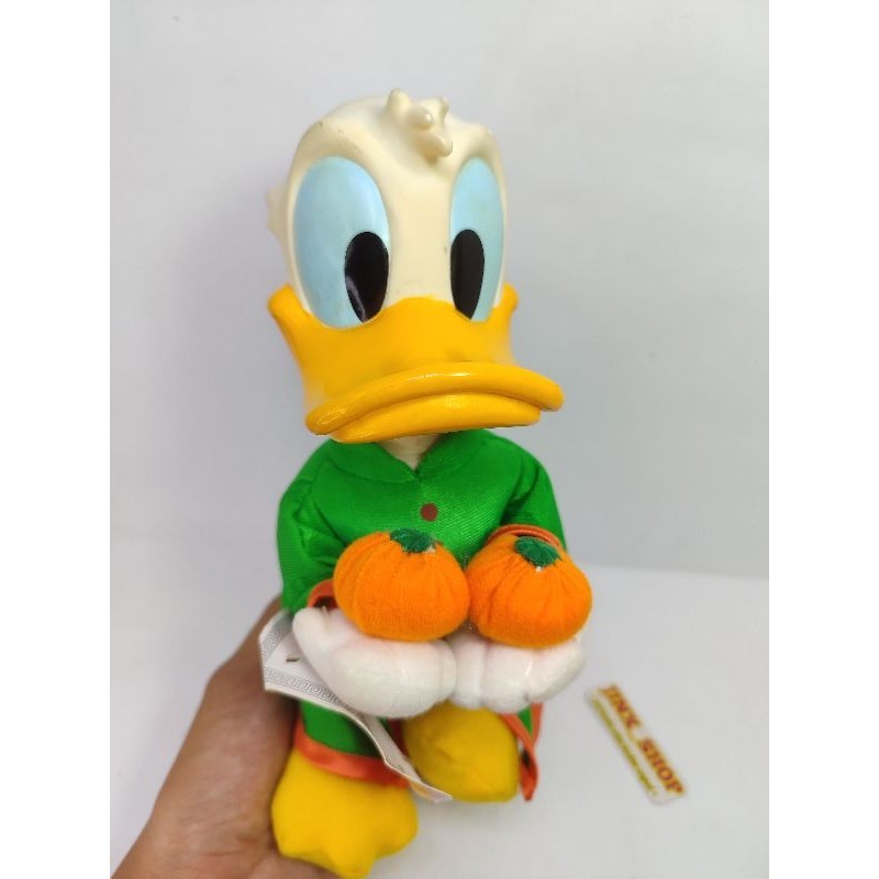 Jual boneka donal duck donal bebek mcd kepala karet | Shopee Indonesia