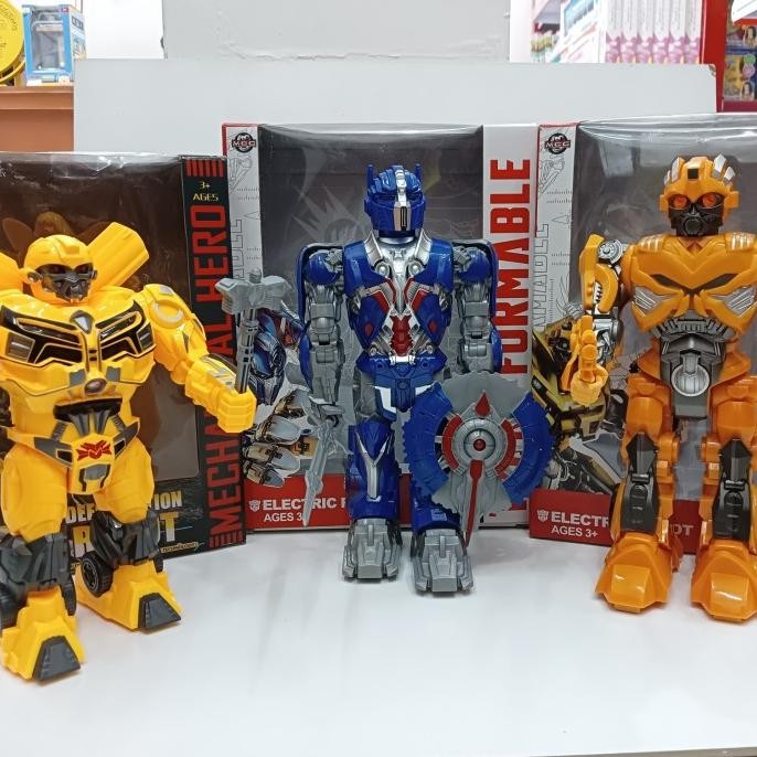 Jual New Mainan Mainan Anak Robot Transformer Optimus Prime Bumble Bee Jalan Baterai | Shopee ...