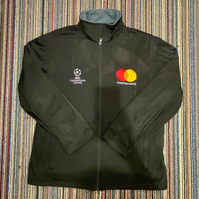 Jual UEFA CHAMPIONS LEAGUE OFFICIAL SOFTSHELL JACKET BLACK ORIGINAL ...
