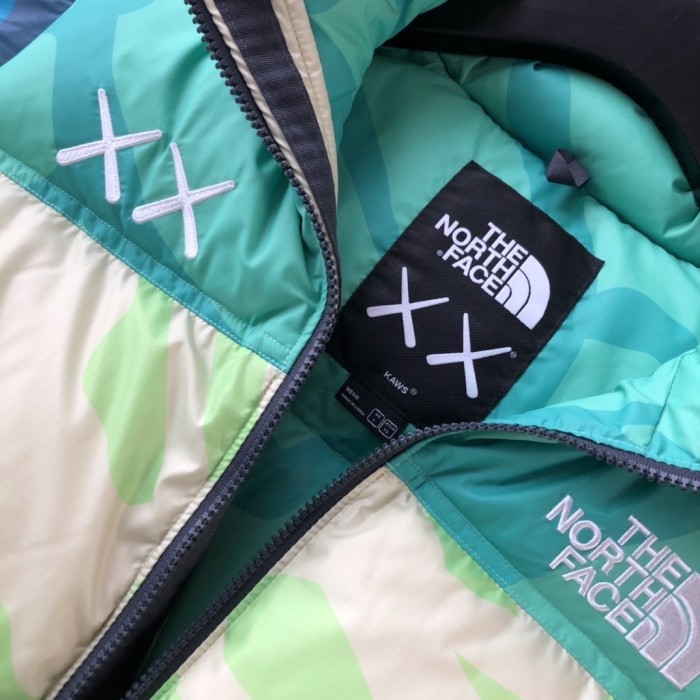 Jual The North Face x Kaws Face Retro 1996 Nuptse Jacket Safety Green | Shopee Indonesia