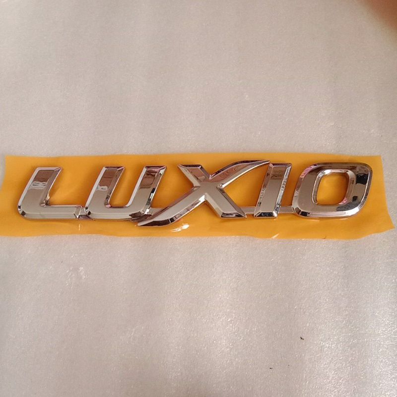 Jual emblem logo tulisan merek luxio original | Shopee Indonesia