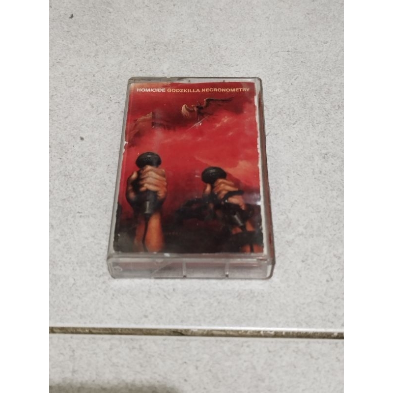 Jual kaset pita HOMICIDE album Godzilla Necronometry | Shopee Indonesia