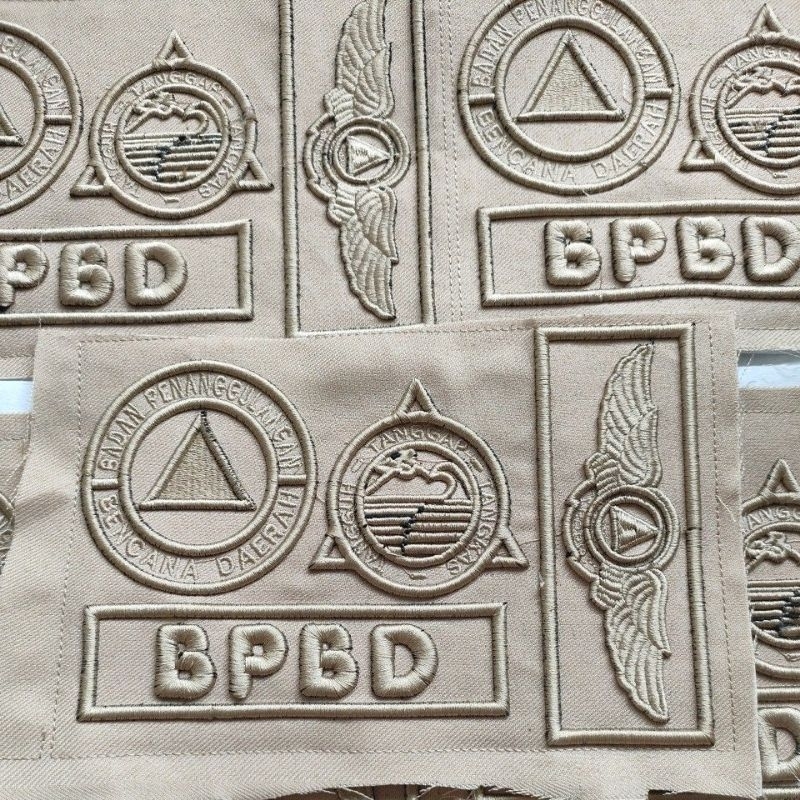 Jual logo BPBD timbul satu set 4 logo warna krem dasar bahan krem ...