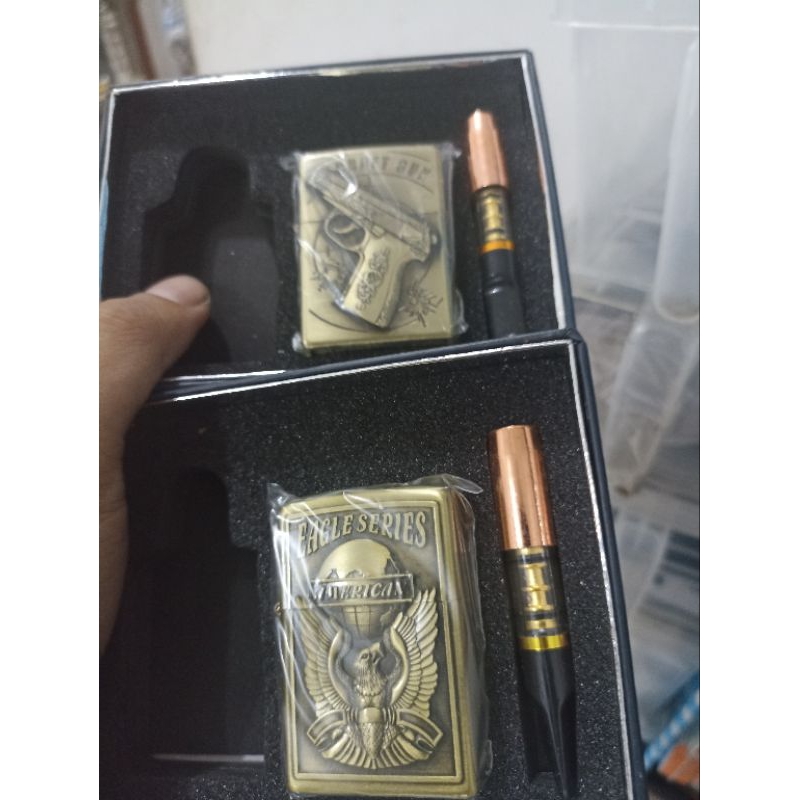 Jual Zippo korek api motif karakter garuda pistol komplit | Shopee ...