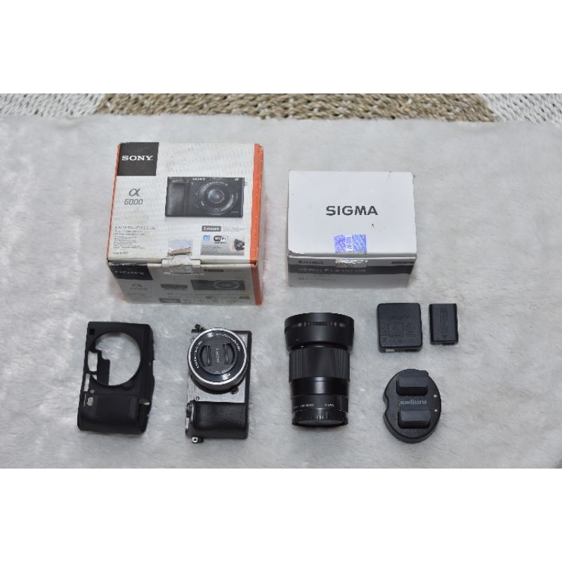 Jual Sony a6000 + lensa kit 16-50mm dan sigma 30 mm | Shopee Indonesia