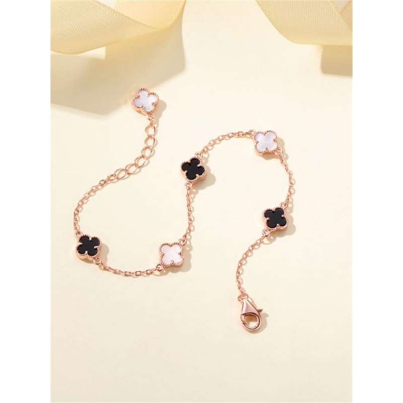 Jual gelang rantai titanium bunga clover hitam putih bolak balik ...