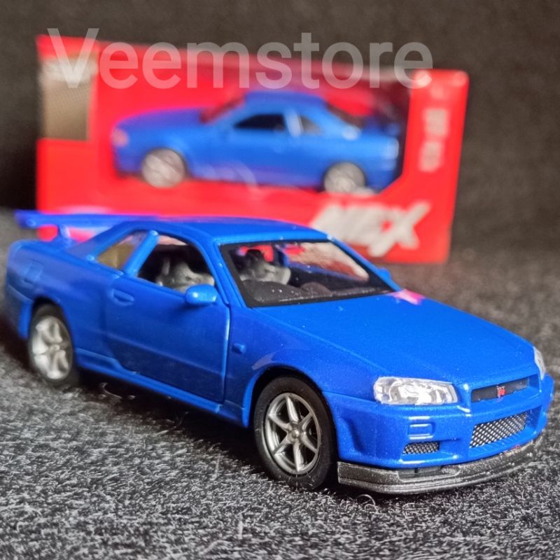 Jual Die Cast 1:36 Nissan Skyline GTR R34 V-spec II NuR [Welly] Open ...