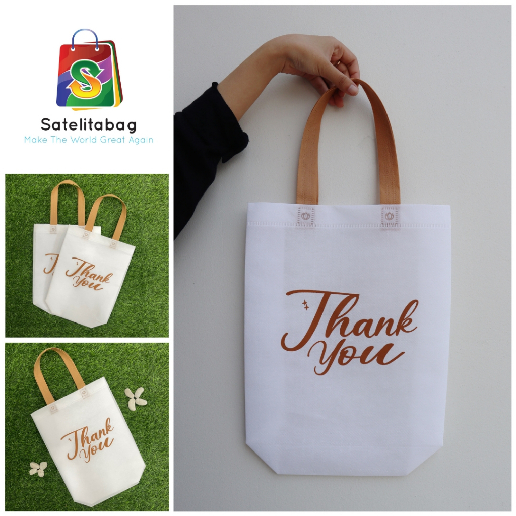 Jual Goodie Bag Tas Sovenir Spunbond Model Handle 25x35x8 (READY STOK) | Shopee Indonesia