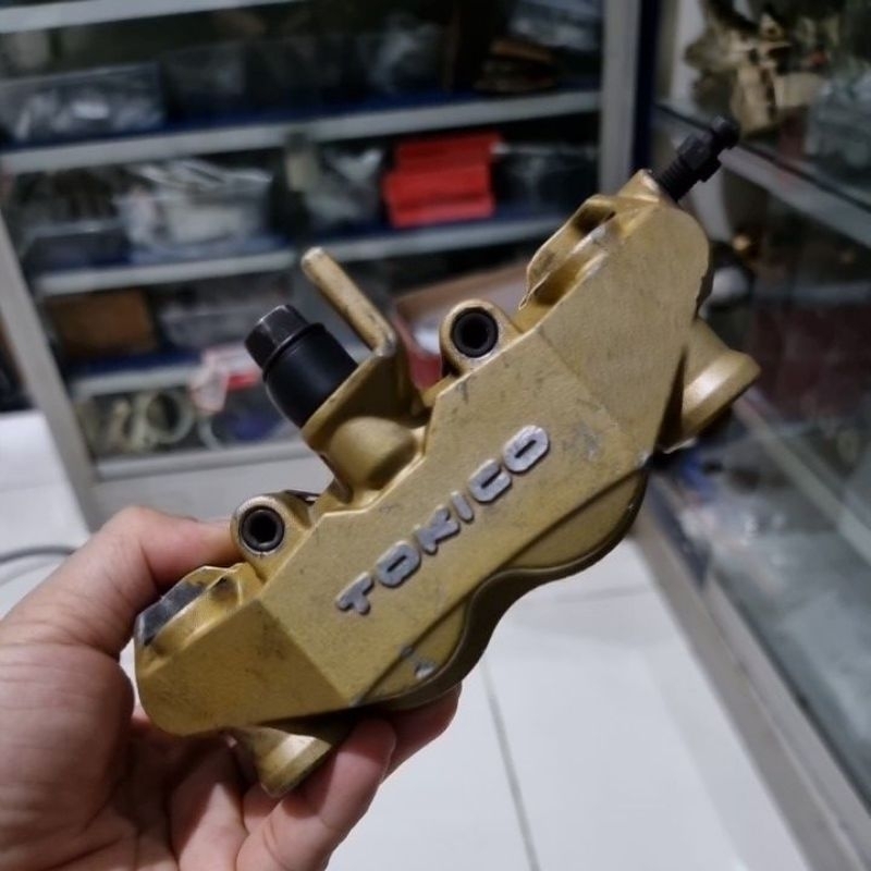 Jual kaliper depan kanan merk TOKICO type Radial 4 Piston pitch 108 mm | Shopee Indonesia