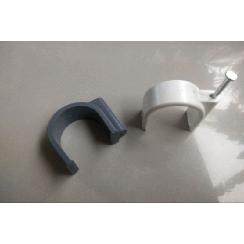 Jual Klem pipa pvc 2 inch 1/2 3/4 plus paku beton..klem pipa paralon ...
