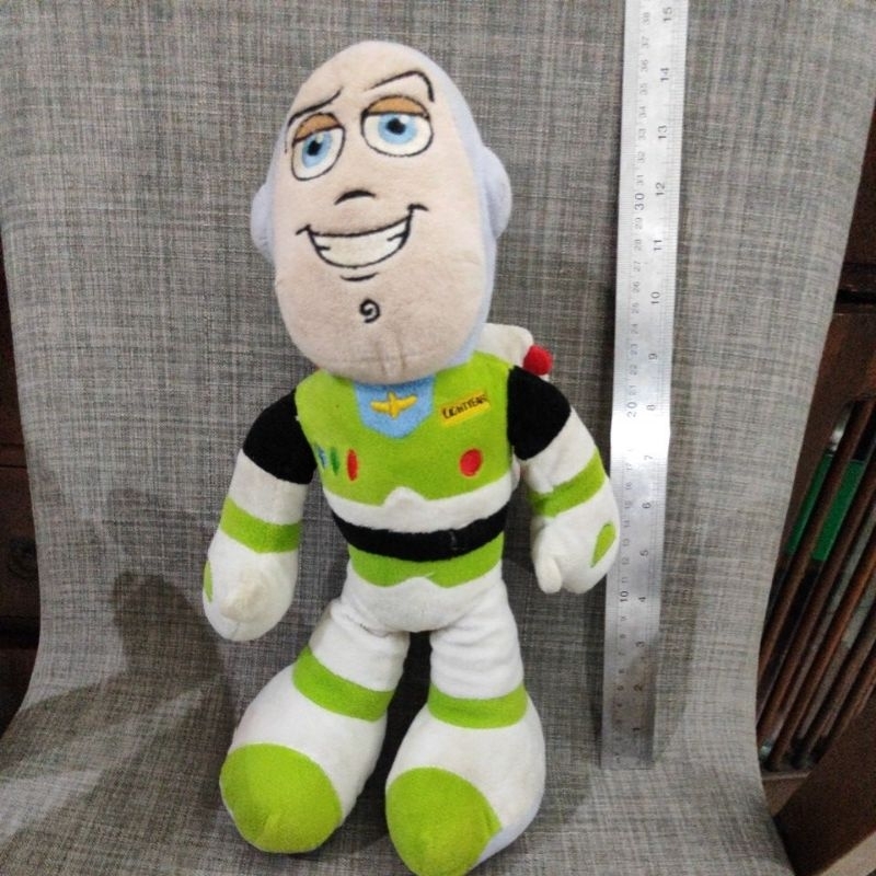 Jual boneka preloved toy story buzz lightyear, dino rex toy story tas ...