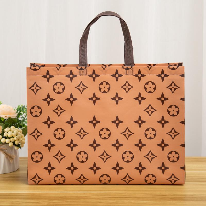 Jual TAS Paper Bag Kain anti air Motif Premium Goodie Bag Kantong ...