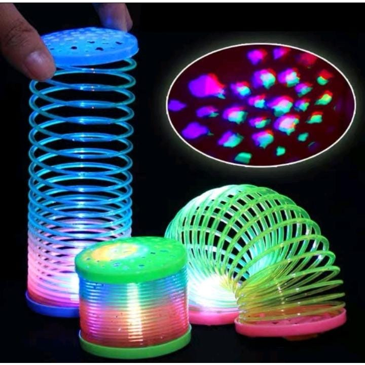 Jual Rainbow ring light projector Mainan Spring Slinky Magic Warna ...