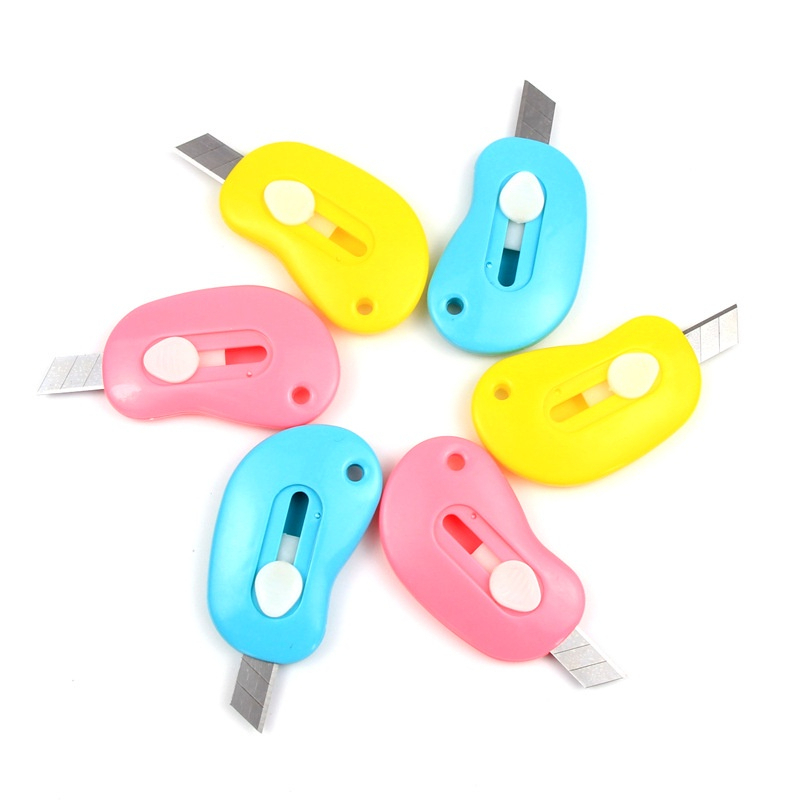 Jual Cutter Mini Portable Bentuk Oval Mini Cutter Polos Travel Kit ...