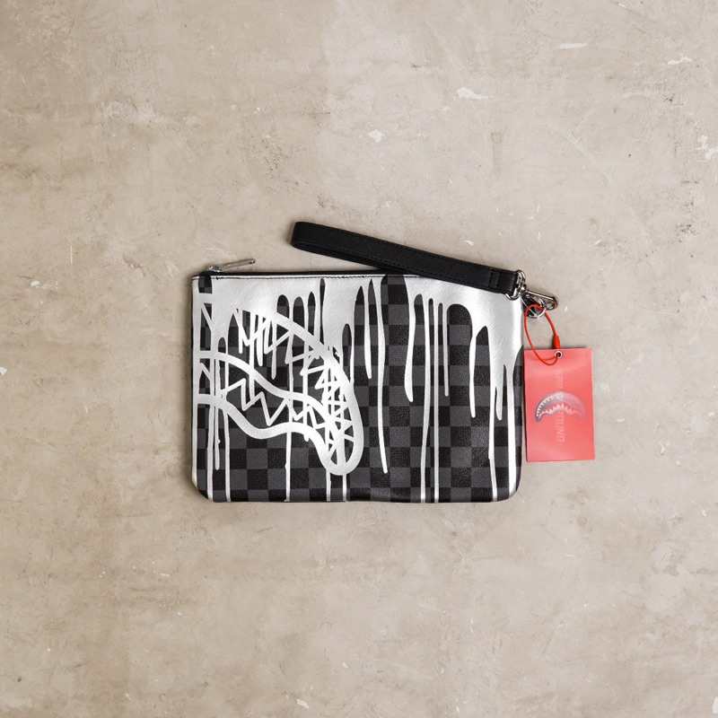 Jual SPRAYGROUND Melt Silver Clutch in Black | Shopee Indonesia