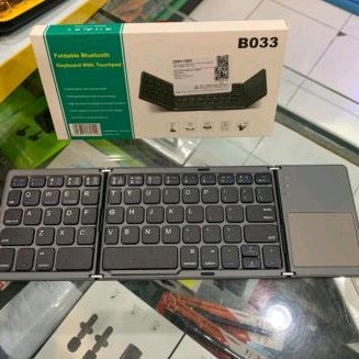 Jual Keyboard foldable and touchpad bluetooth keyboard lipat | Shopee ...