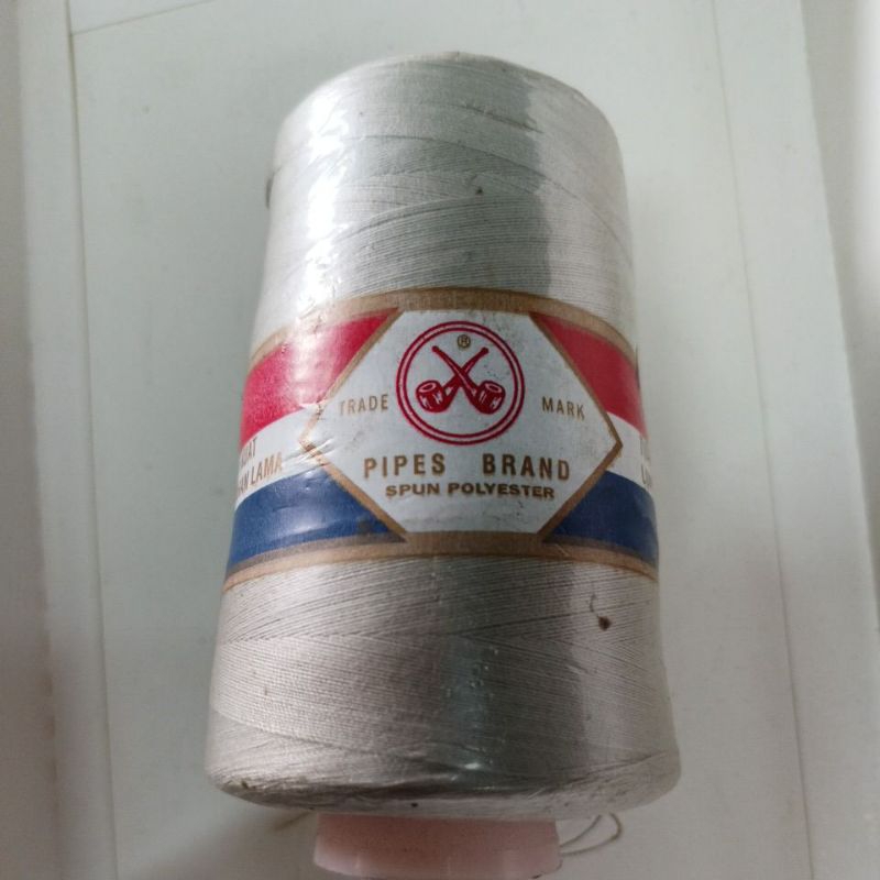 Jual Benang Jahit katun spun Polyester 20/2 serat tebal pipes brand abu ...