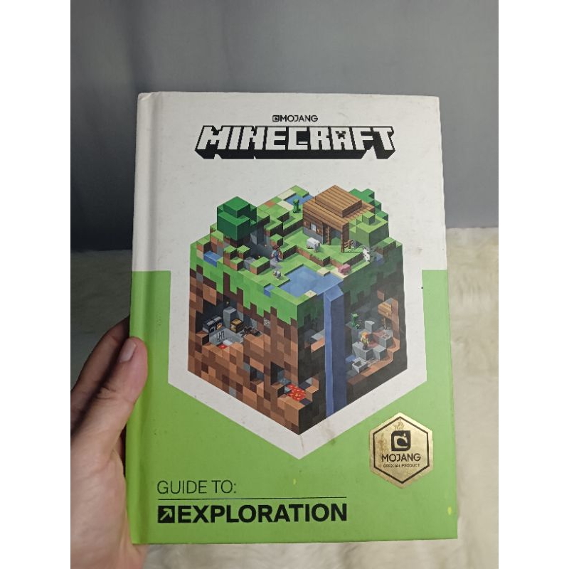 Jual Buku minecraft import ori mojang Guide to exploration preloved ...