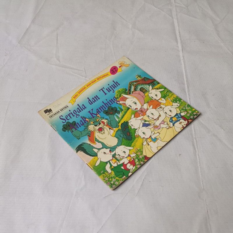 Jual buku dongeng anak-anak bergambar SERIGALA DAN TUJUH ANAK KAMBING ...
