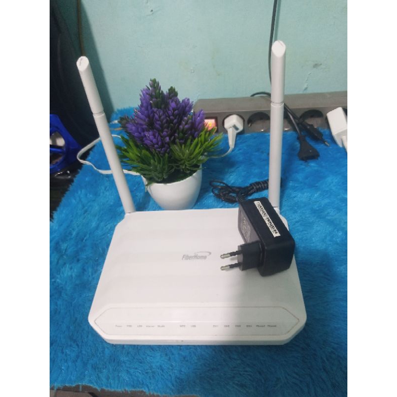 Jual fiberhome polos + adaptor (hg6243c) Gpon onu | Shopee Indonesia