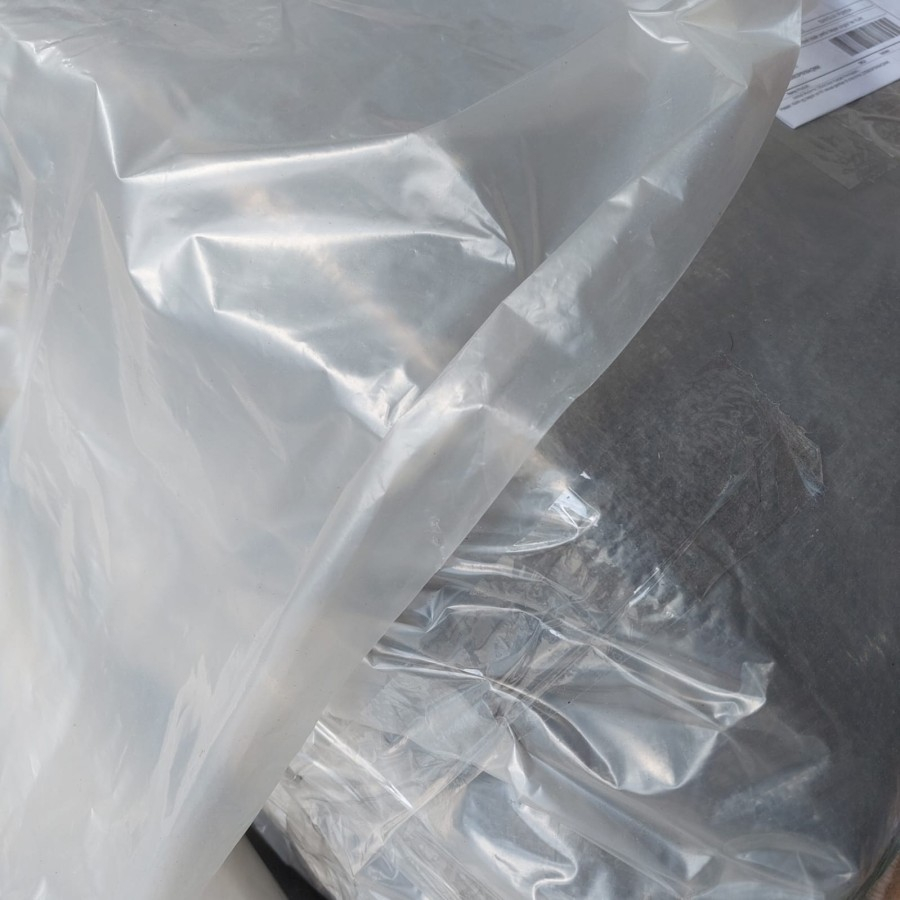 Jual Plastik pembungkus paket putih-recycled / alas cor bidang lebar ...