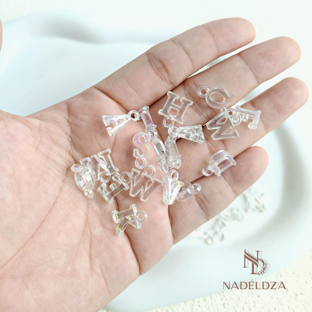 Jual Manik Mote Charm Huruf Bening AB Transparan (25gr) | Shopee Indonesia