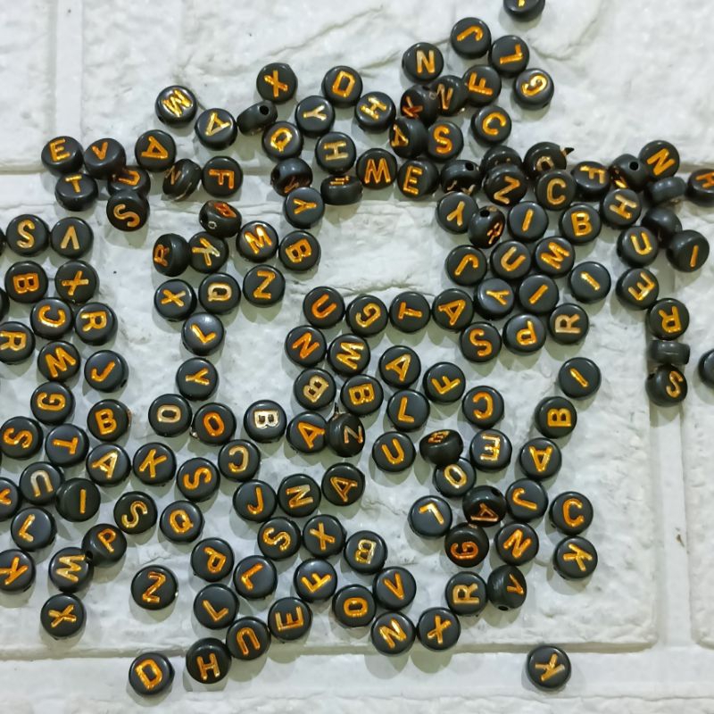 Jual Mote Bulat Pipih Hitam Huruf Emas 15gram (isi +/- 90biji) | Shopee ...