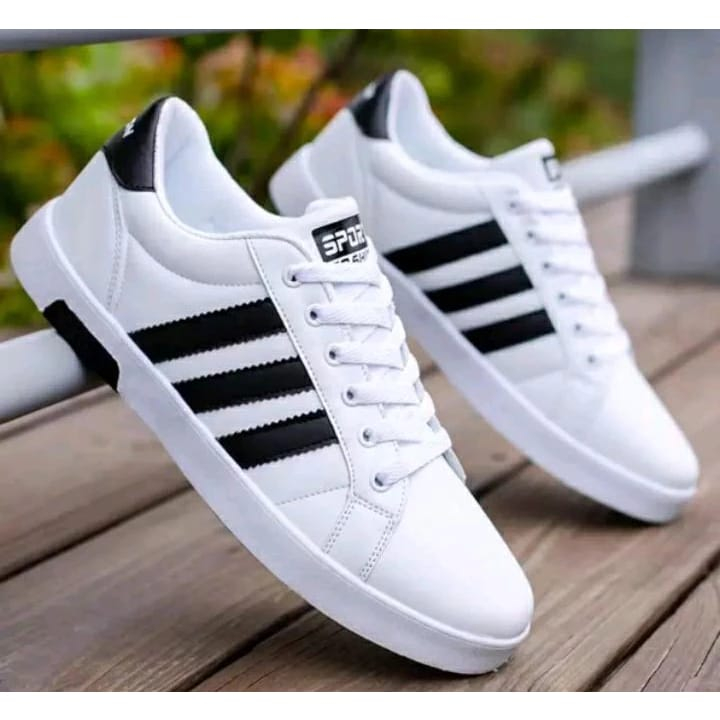 Jual sepatu pria snaekers hitam dan putih model garis plat 3 | Shopee ...