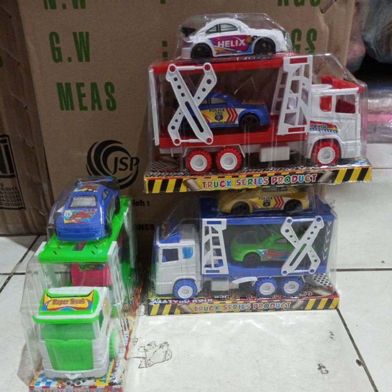 Jual Mainan mobil truk Volvo mika pengangkut mobil balap ST 2081 ...