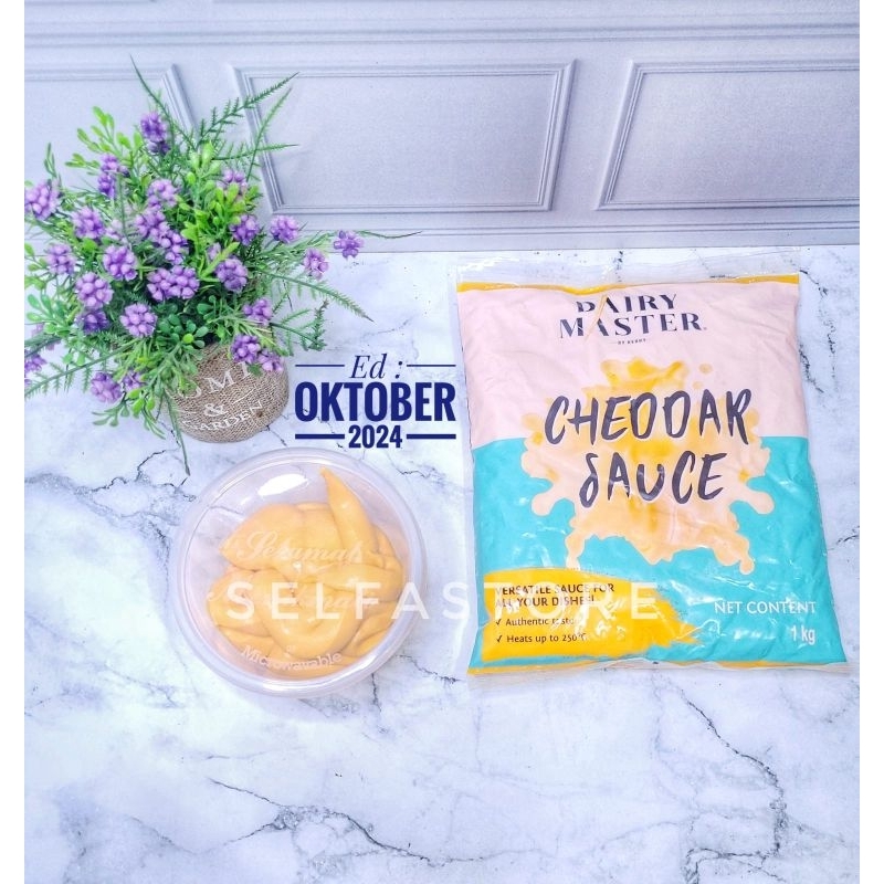 Jual Dairy Master Cheddar Cheese Sauce 1 kg Saus Krim Keju Siap Pakai ...