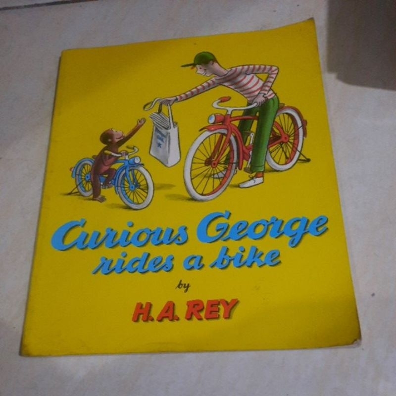 Jual CURIOUS GEORGE RIDES A BIKE BY H A.REY | Shopee Indonesia
