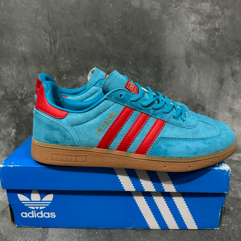 Jual sepatu sneakers spezial blue ice list red premium original high ...