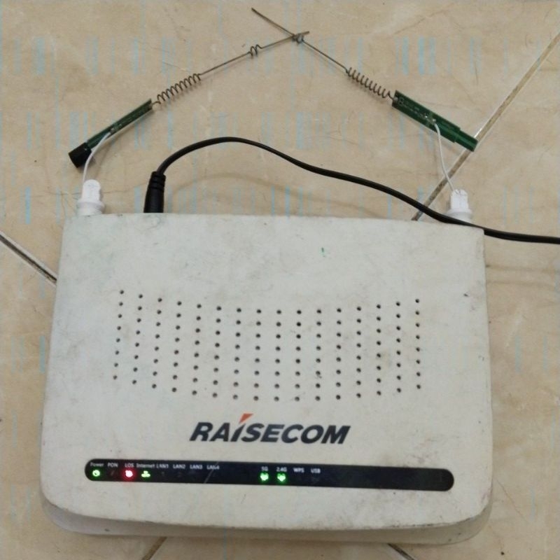 Jual modem: raisecom gpon onu iscom ht803g-ws2 kondisi seperti foto ...