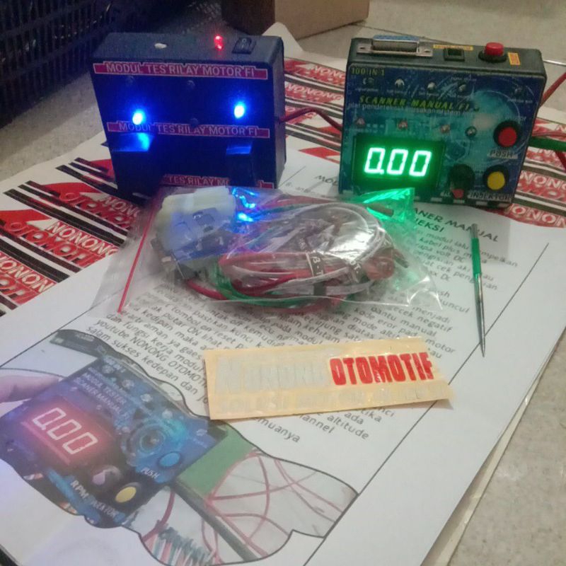 Jual tester modul scaner manual fi 100 in 1 dan alat cek rilay kaki 4 ...