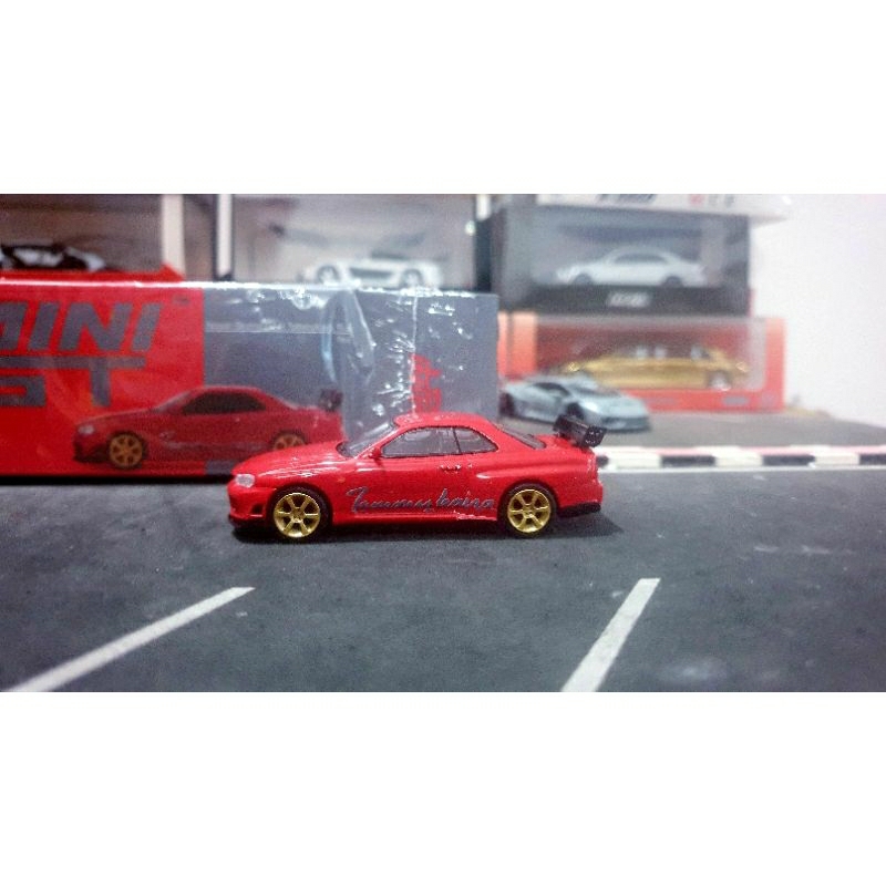 Jual Diecast Mini GT Nissan Skyline GTR R34 Tomykaira RZ Red no 543 | Shopee Indonesia