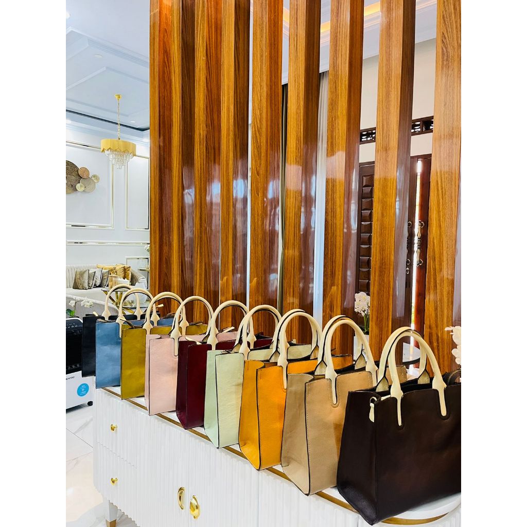 Jual TAS KUNLIT WANITA MODEL F0SSIL KOMB PUTIH PREMIUM SIZE L - TOKO ...