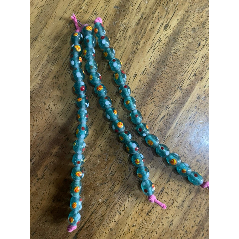 Jual manik manik kaca bulat hijau bening variasi titik merah | Shopee ...