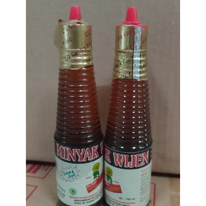 Jual MINYAK WIJEN CAP BUNGA MATAHARI 100ML HALAL | Shopee Indonesia